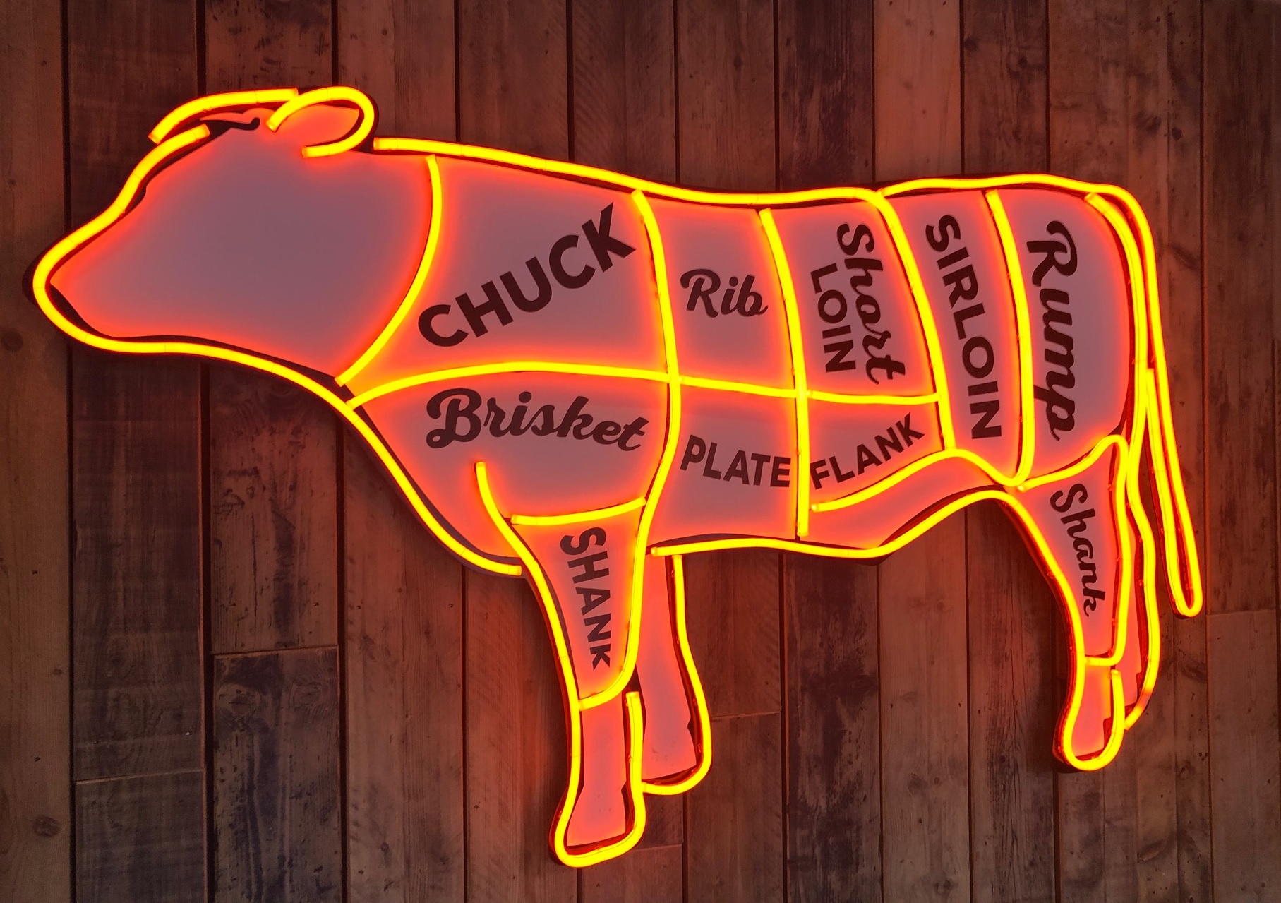 Cow neon light at Bar + Block – The Nottingham Food Blog